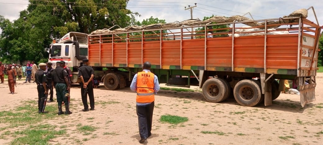 Distribution of relief materials to victims of a windstorm disaster and ...